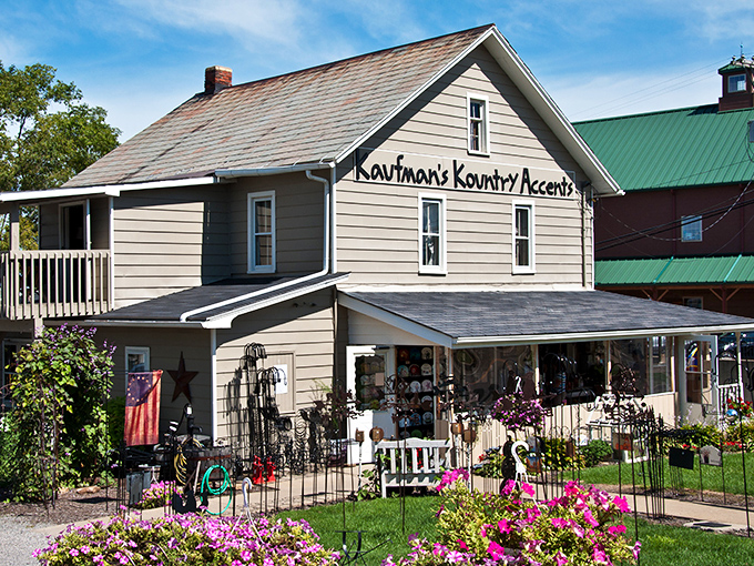 Kaufman's Kountry Accents blooms with both flowers and folk art &ndash; the kind of porch where you immediately want to sit and stay awhile.