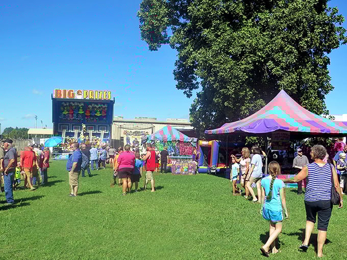 Carnival rides and colorful tents transform an ordinary park into a magical playground during Rector's beloved Labor Day celebration.