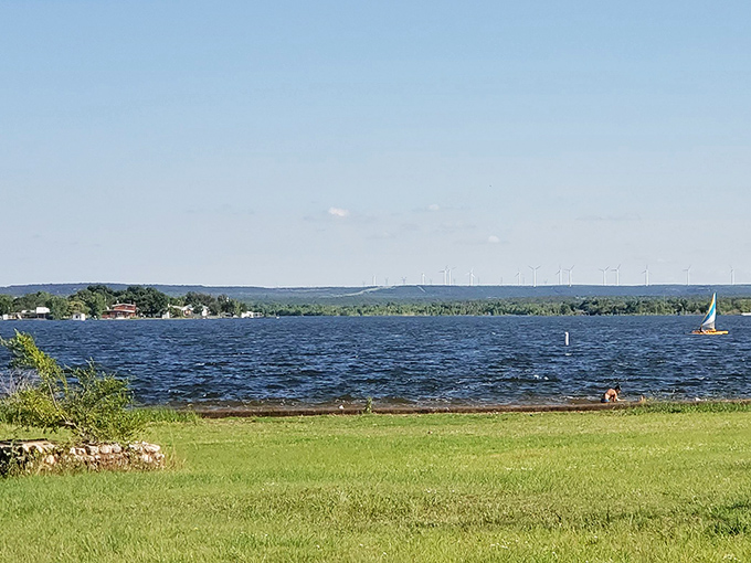 Lake Sweetwater sparkles under the Texas sun, offering waterfront views at prices that would make coastal property owners weep into their mortgage statements.