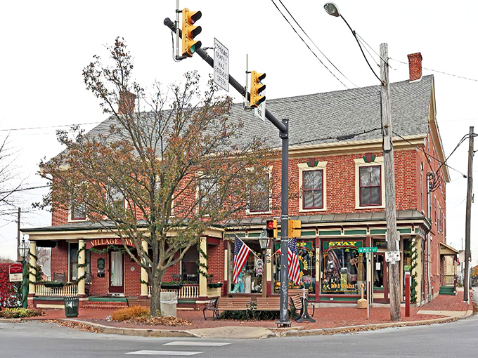 The Village Store sits at the crossroads of Strasburg like the town's living room, where brick, flags, and front porches create the perfect Norman Rockwell setting.