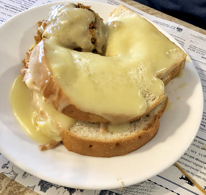 Hot turkey sandwich smothered in gravy so good you'll want to write poetry about it&mdash;comfort food that speaks the universal language of "mmmmm."