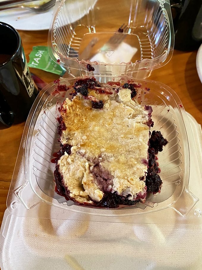 This isn't just cobbler - it's summer in Oregon captured in a plastic container, ready for roadside consumption.