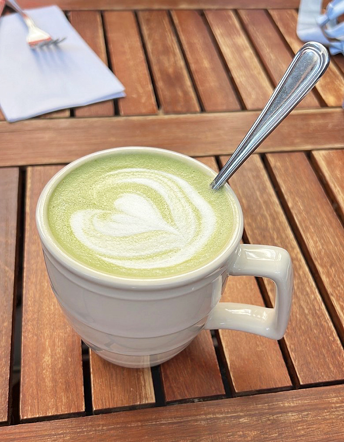This matcha latte's vibrant green hue and delicate heart design might just convert even the most dedicated coffee loyalist.