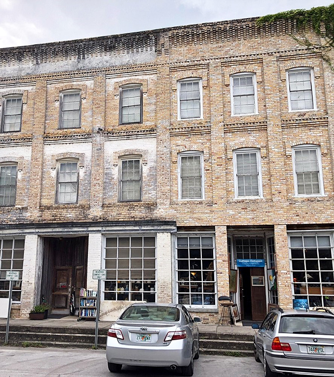 Micanopy's historic district buildings have the dignified patina that comes from surviving a century of Florida humidity – something my hair never manages.
