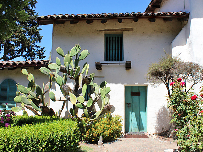 White adobe walls and red tile roofs exemplify the Spanish colonial style that shaped California's identity.