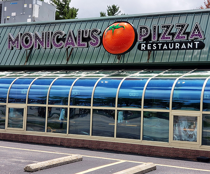 Monical's Pizza announces itself with a tomato the size of a small planet &ndash; subtlety isn't on the menu, but good pizza is.