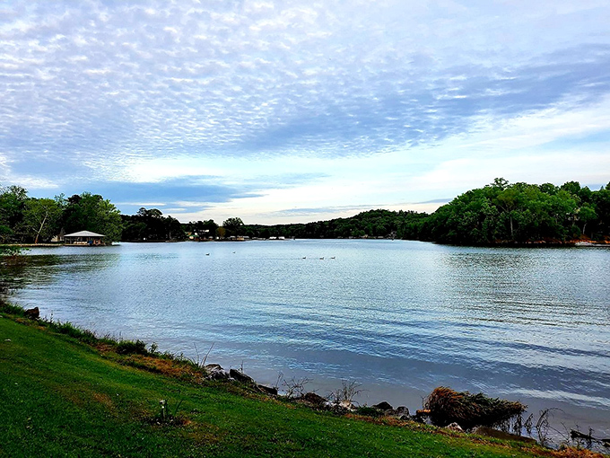 Neely Henry Lake stretches toward distant hills, a playground for boaters and anglers where time slows down and weekends stretch gloriously longer.