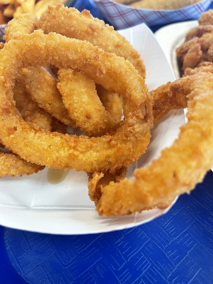 Onion rings that could double as golden bracelets&mdash;each one a perfect circle of sweet onion wrapped in crispy batter that shatters with satisfying crunch.