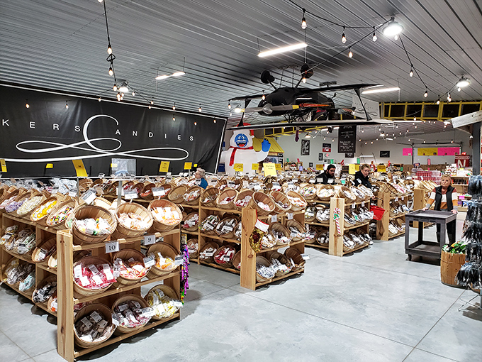 Wooden baskets stretch toward the horizon, filled with treats organized with military precision. The spacious interior invites leisurely exploration.