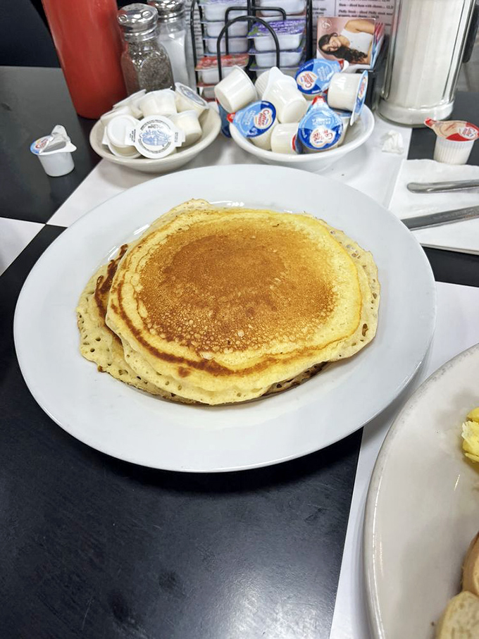Pancakes with the perfect golden-brown hue that would make other breakfast establishments hand in their spatulas in defeat.