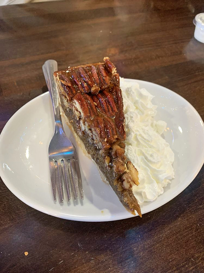 Pecan pie that makes you question why you ever save room for anything else. That dollop of whipped cream isn't optional&mdash;it's essential.