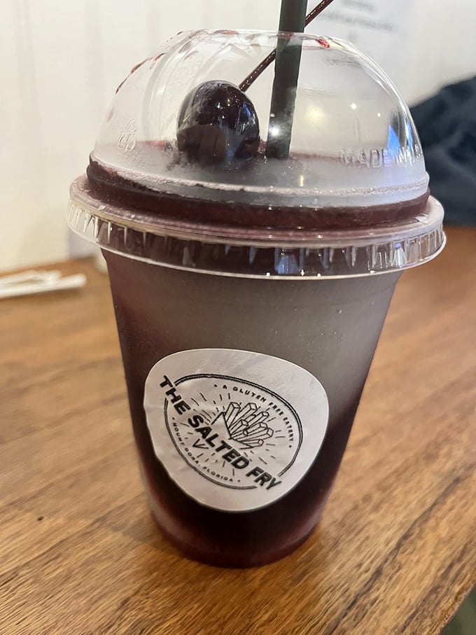 The Black Cherry slushie arrives like a childhood memory upgraded for adulthood&mdash;sweet, refreshing, and sporting The Salted Fry's logo like a badge of honor.