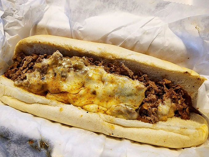 This Philly cheesesteak isn't just a sandwich&mdash;it's a commitment. The melted cheese embraces the meat like a warm hug.