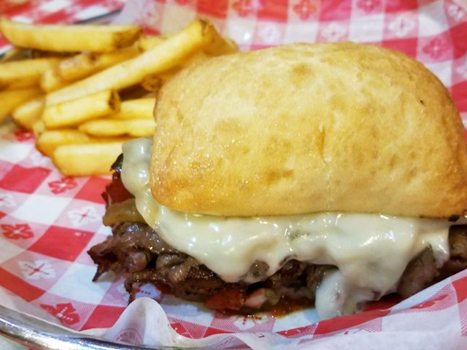 Prime rib sandwich under a blanket of melted cheese. I'd fight my own grandmother for the last bite of this magnificent creation.