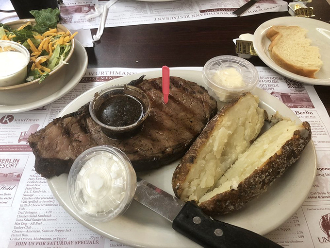 Prime rib that doesn't need fancy presentation because it's too busy being absolutely delicious. That baked potato is living its best life.