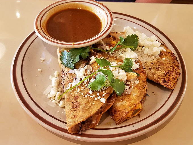These aren't your average breakfast tacos&mdash;they're a morning fiesta topped with fresh cilantro and cotija cheese that would make abuela proud.