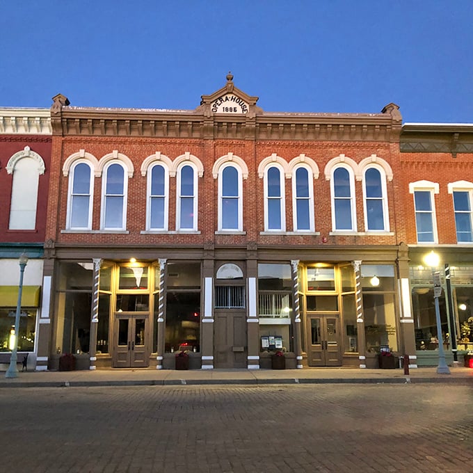 The Opera House glows at dusk, a cultural beacon that's been bringing arts to the prairie since horses were the preferred parking option.