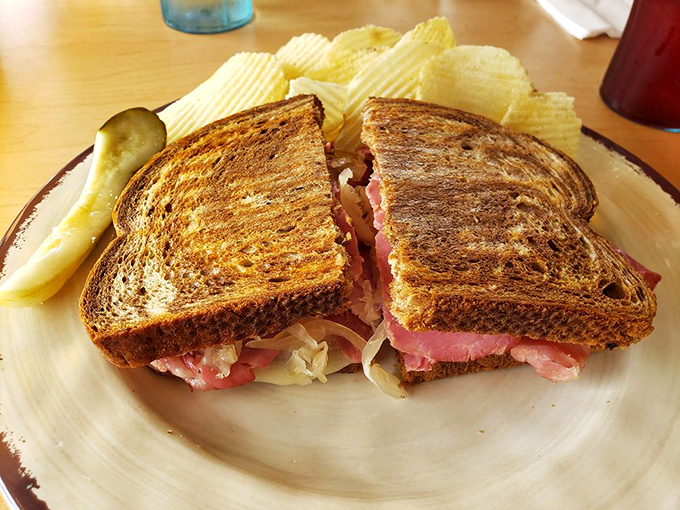 A proper Reuben should require both hands and several napkins. This beauty, with its perfectly grilled rye, clearly understood the assignment.