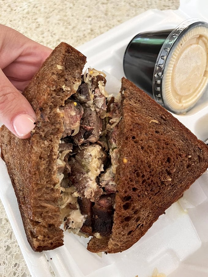 This brisket sandwich isn't messing around. It's what would happen if Texas and New York had a delicious food baby.