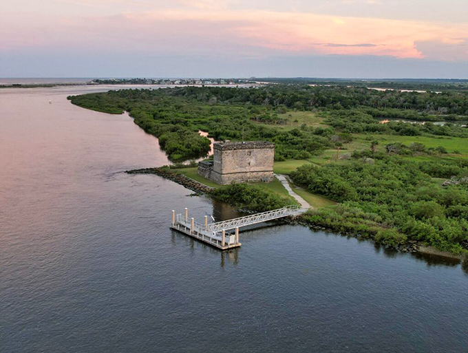 Fort Matanzas stands as nature's quiet sentinel, where marsh meets river meets history in a tableau that hasn't changed for centuries.