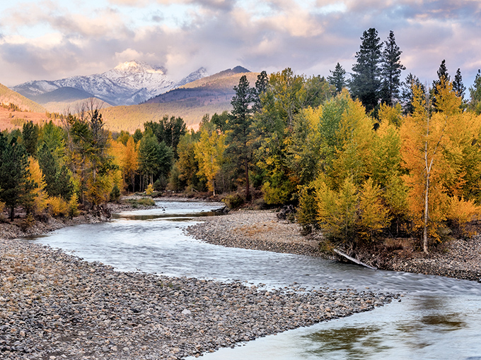 Fall in the Methow Valley transforms ordinary rivers into extraordinary masterpieces, where golden aspens reflect in waters clear enough to count the stones below.
