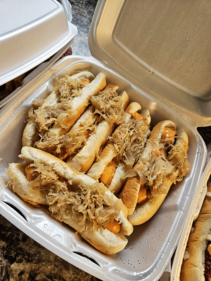 Sauerkraut-topped dogs proving that sometimes the best relationships involve a little bit of tang and tradition.