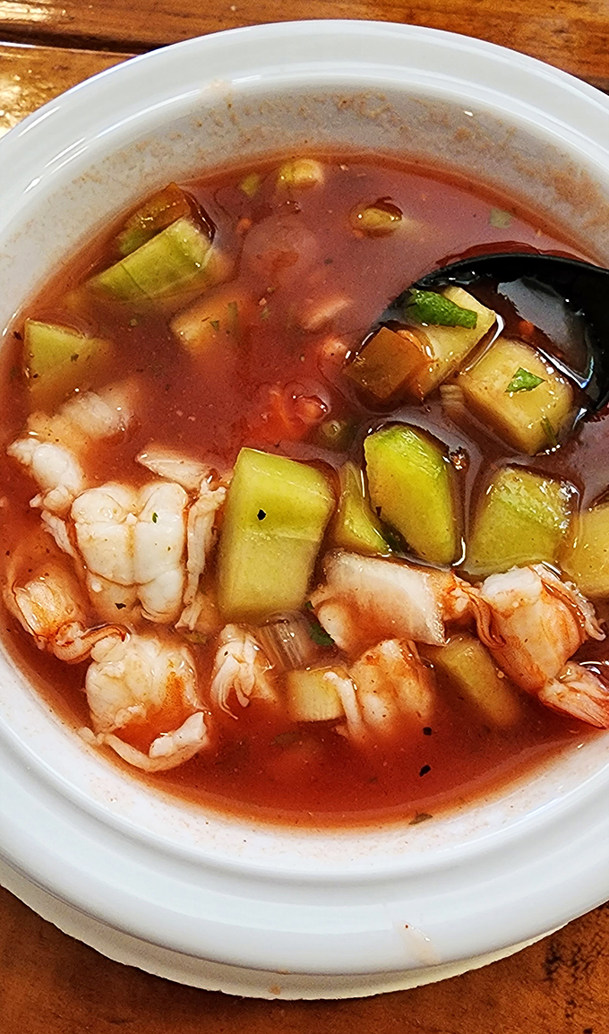 A proper shrimp cocktail swimming in zesty broth with cucumber&mdash;like a refreshing pool party where everyone's invited.