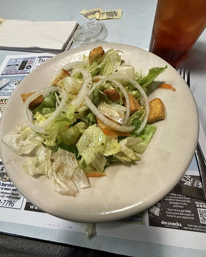 Even the humble side salad gets the respect it deserves here&mdash;crisp lettuce, fresh onions, and croutons that actually crunch. No sad salad syndrome in sight. 