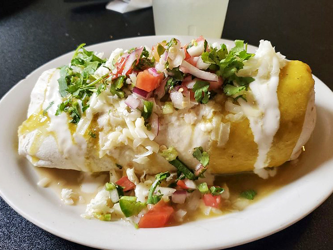 Wrapped in a golden tortilla and smothered with sauce, this burrito doesn't just satisfy hunger&mdash;it obliterates it with a fiesta of textures and flavors.