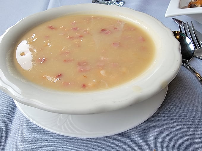 A bowl of potato soup that could make a Frenchman weep. Simple ingredients transformed into liquid gold through generations of know-how and zero shortcuts.
