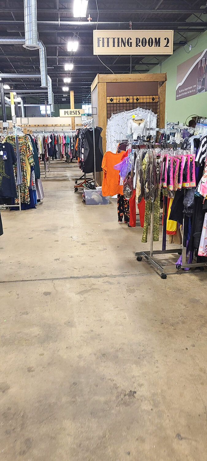 Fitting rooms and clearly marked departments make this thrift store shopping experience feel more boutique than bargain bin.