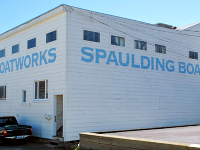 Spaulding Wooden Boat Center preserves the art of traditional boat craftsmanship, where the smell of cedar shavings and marine varnish tells stories of maritime heritage.