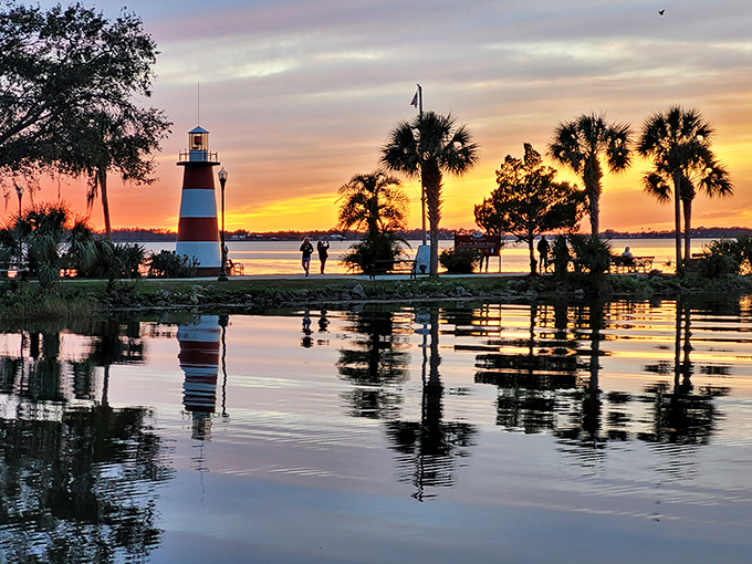 The lighthouse at sunset creates the kind of moment that makes smartphone cameras feel wholly inadequate. Some views deserve to be remembered rather than captured. 