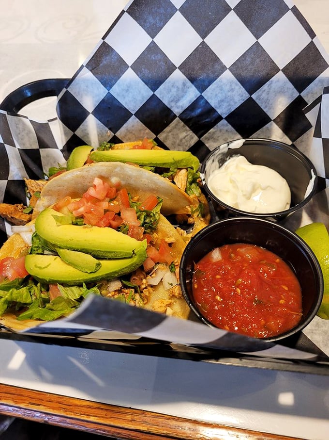 These aren't just tacos; they're edible color wheels of avocado, tomato, and protein, served with sauces worth bottling and taking home.