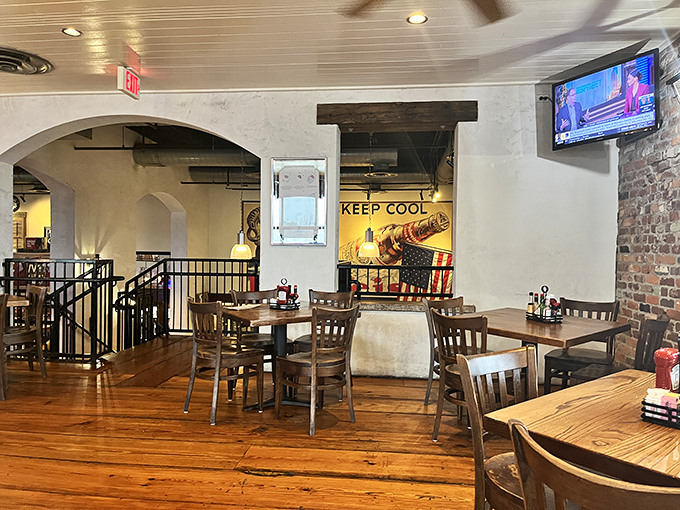 Upstairs at The Chimes: where the views improve and the conversations deepen. Wooden charm and strategic TV placement for game day perfection.