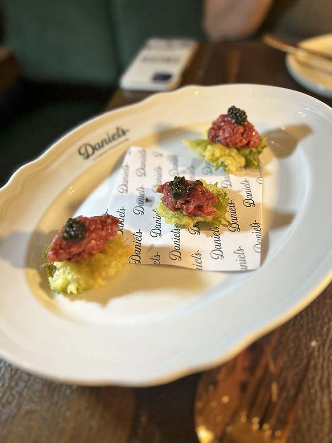 Tartare topped with caviar—because sometimes luxury should be layered. Like wearing cashmere over silk, but for your mouth.