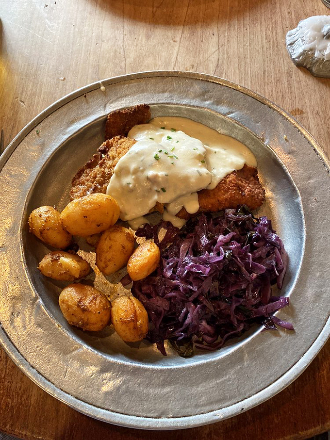 Wiener schnitzel with potatoes and red cabbage&mdash;a European vacation for your mouth without the hassle of passport control.