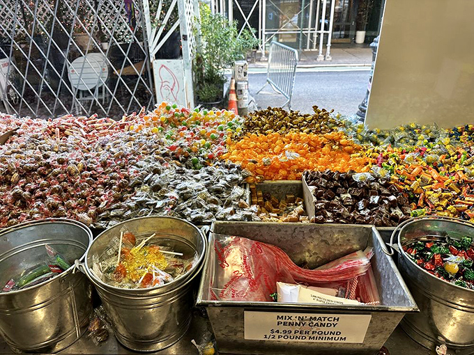 Candy by the pound creates a landscape of sugar mountains, where scoops plunge into sweet terrain like prospectors mining for golden nuggets of joy.