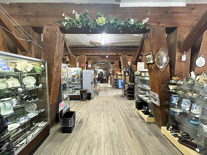 This display case offers everything from elegant hurricane lamps to vintage tennis rackets. The trumpet at the bottom is just waiting for someone to play "Antiques Roadshow" theme music.