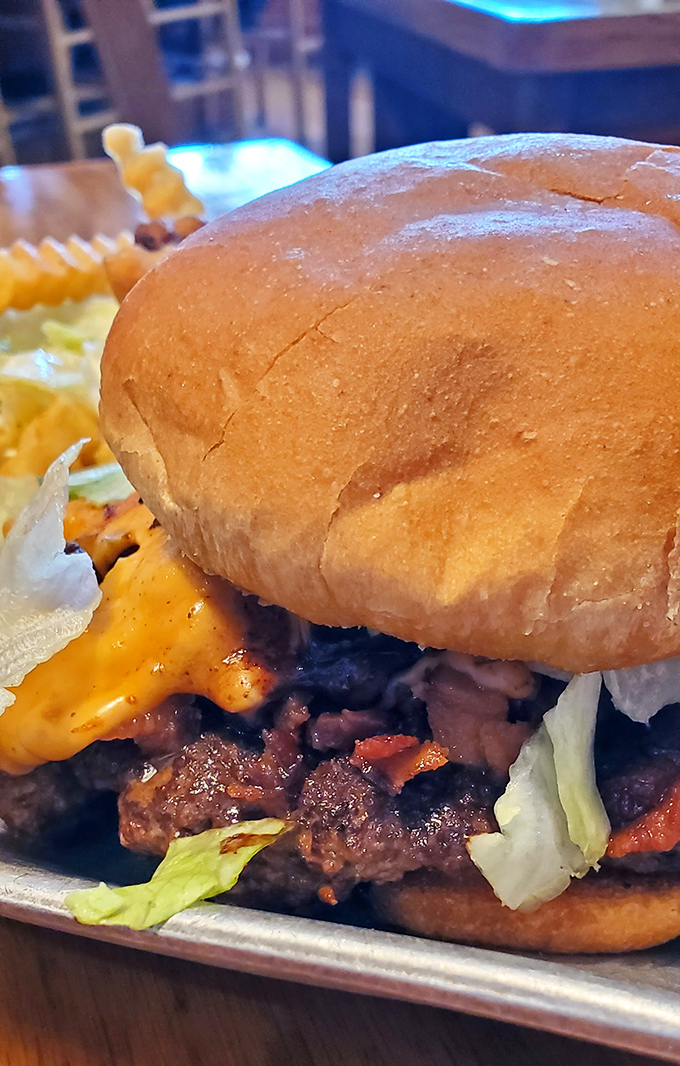 This isn't just a burger—it's a masterpiece of melty cheese, perfectly seared beef, and fresh toppings that puts fancy $20 city burgers to shame.