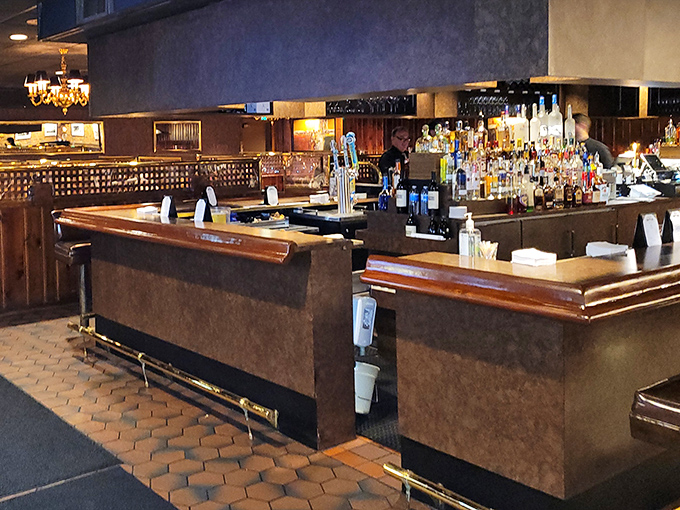 The bar counter&mdash;where strangers become friends and friends become family. Wood polished by thousands of elbows and countless stories.