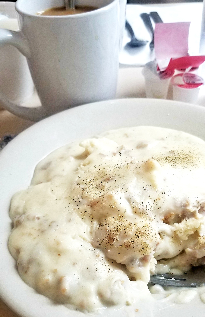 Biscuits and gravy: the breakfast that hugs you from the inside. This plate doesn't just feed your body&mdash;it nourishes your soul with creamy, peppery goodness.