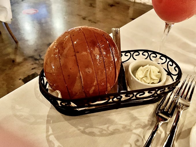 Warm bread arrives like a edible hug, setting the stage for the culinary adventure ahead.