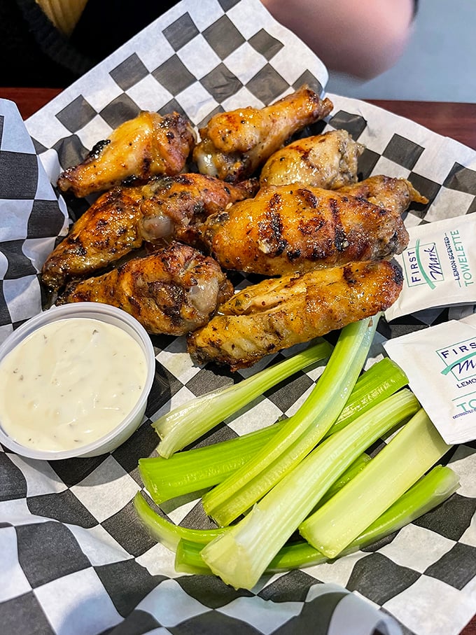 Wings that have clearly been introduced to fire and flavor in equal measure. That side of ranch isn't just a condiment&mdash;it's a cooling companion.