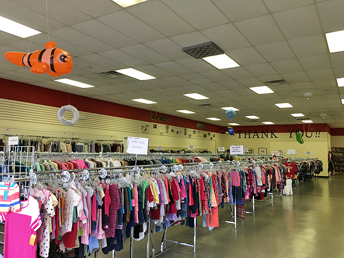 A clownfish balloon watches over tiny fashionistas-in-training. Even Nemo knows where to find the best kids' clothes deals.