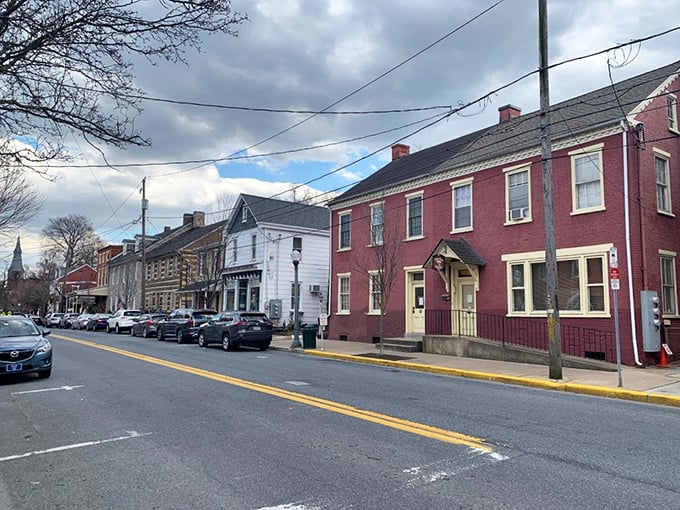 Colorful historic buildings line this quintessential small-town street, each facade telling a chapter in Lititz's ongoing story of preservation and community.