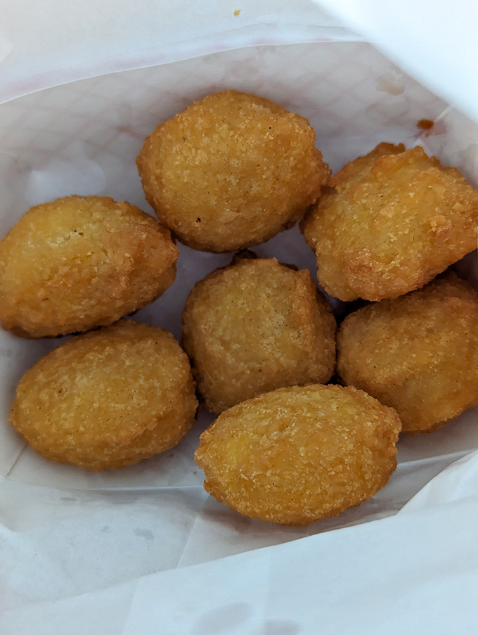 Corn fritters that could make a grown person weep with joy. These golden orbs are what donut holes dream of becoming when they grow up.