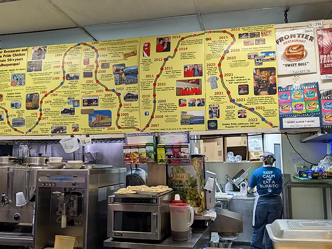 The timeline wall tells Frontier's story while staff orchestrate the breakfast ballet&mdash;a choreography of spatulas and smiles.