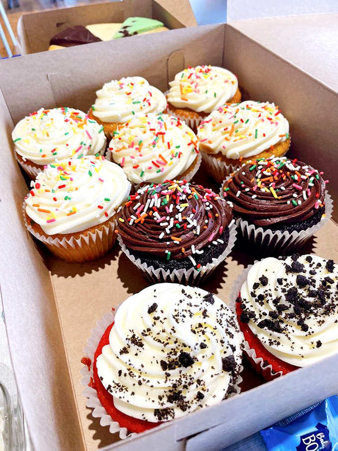 Cupcakes lined up like sweet soldiers, each one frosted to perfection. These aren't just desserts; they're edible works of art in convenient single servings.