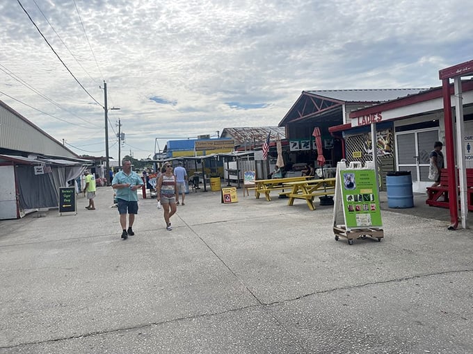 The true Florida experience isn't complete without a stroll through these concrete pathways, where locals have been finding bargains since before Disney expanded.